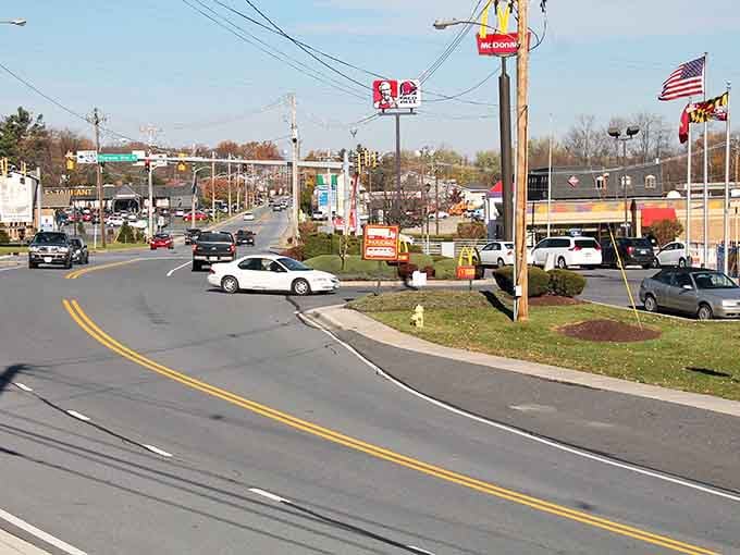 Small-town America at its finest, where every street corner tells a story and flags fly proudly.