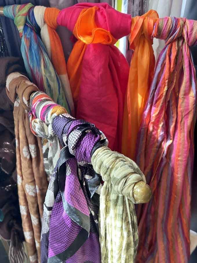 Silk scarves cascade in sunset hues that would make Joseph's technicolor dreamcoat jealous of the competition here.