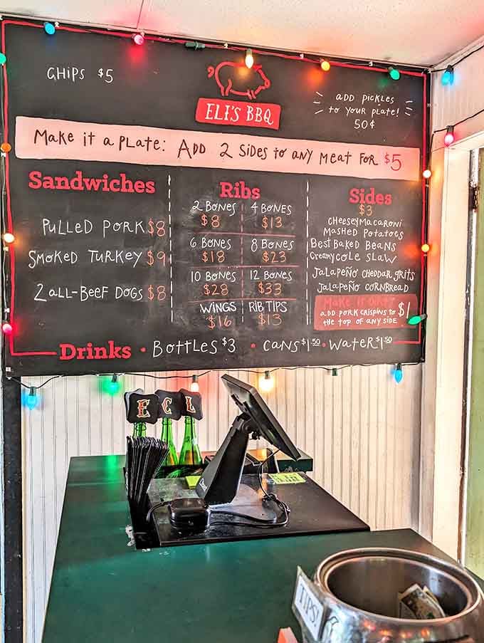 Chalkboard menus with string lights overhead: where casual dining meets serious barbecue without any pretense whatsoever.