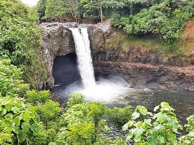Rainbow Falls lives up to its name, cascading 80 feet into a misty pool that Hawaiian legends say once housed a goddess.