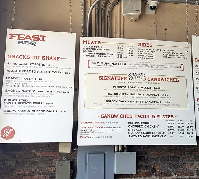 The menu board speaks the universal language of smoked meats, and yes, you want it all.