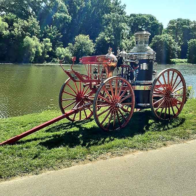 That vintage fire engine by the Cass River isn't just for show; it's a reminder of simpler times.
