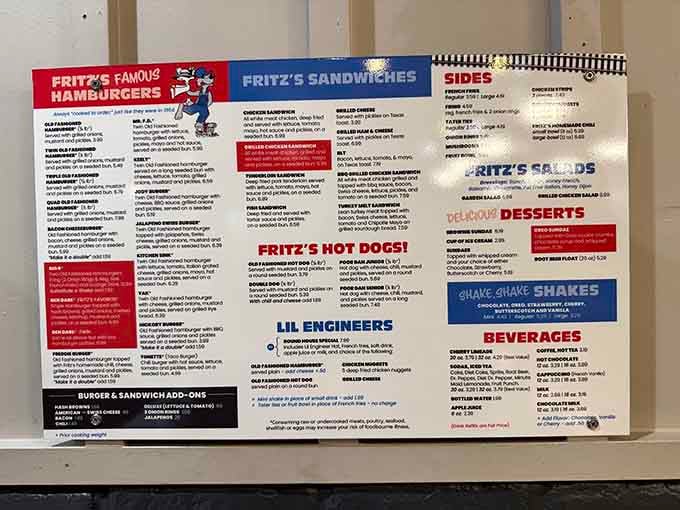 The menu board reveals everything from famous hamburgers to "Lil Engineers" meals, all destined for train delivery to your table.