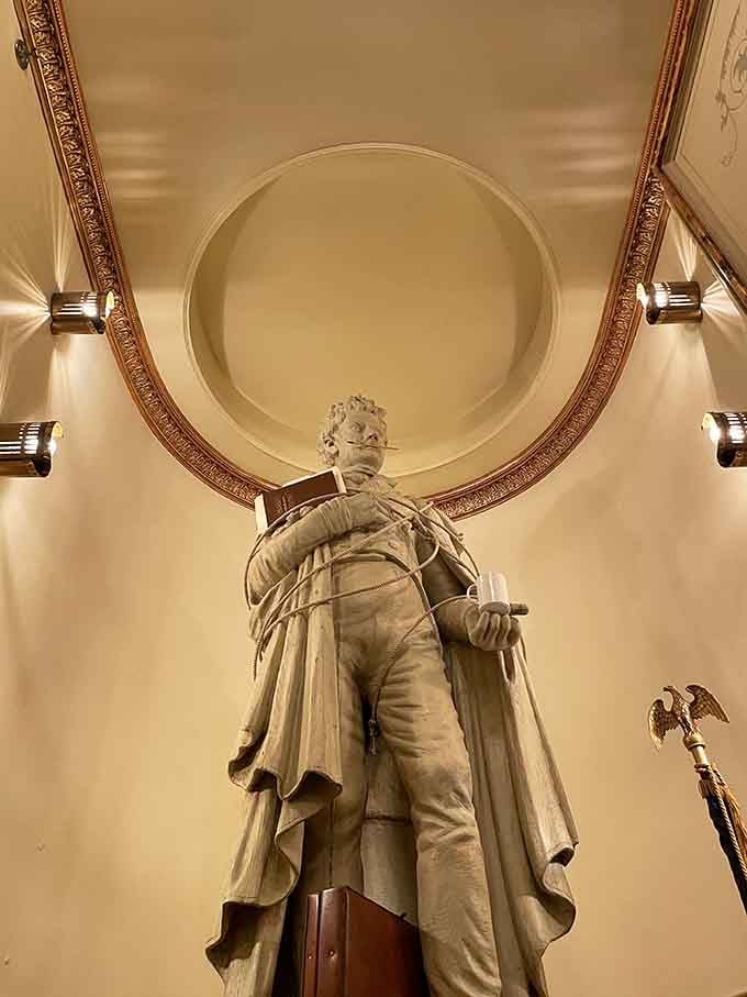 This statue stands guard like a theatrical sentinel, reminding everyone that history and art belong together.