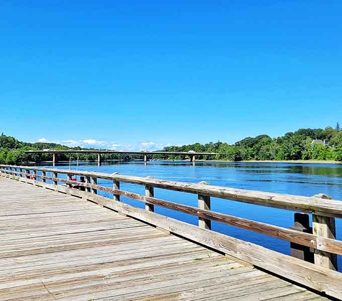 The Kennebec River boardwalk offers more than scenic views; it's where locals recharge without depleting their bank accounts.