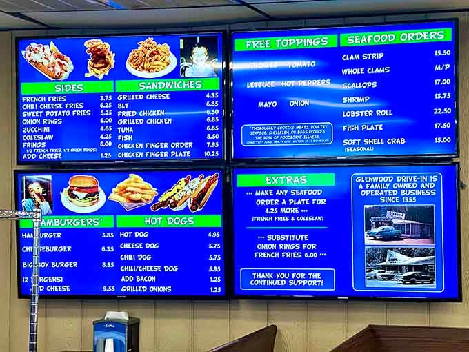 The glowing menu board displays everything from classic dogs to fresh seafood, proving variety doesn't require complexity.
