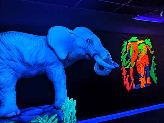 This magnificent elephant glows electric blue, standing guard over the course like a psychedelic sentinel from another dimension.