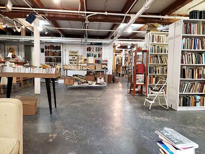 Floor-to-ceiling books create corridors of possibility where every turn reveals another literary treasure waiting to be discovered.