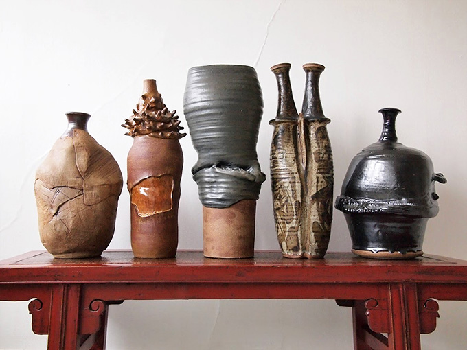 Not your average flower holders! These sculptural ceramic vessels look like they belong in a modern art museum rather than your aunt's china cabinet.