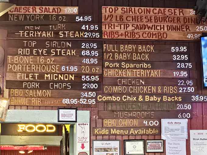 This menu board tells you everything: serious barbecue options and steaks that mean business, no pretense required.