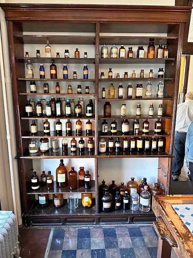Original bottles lined up like soldiers, each containing compounds that would make today's pharmacists reach for their reference books.