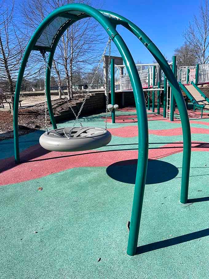 That saucer swing under the green arch looks like something straight out of a Jetsons episode.