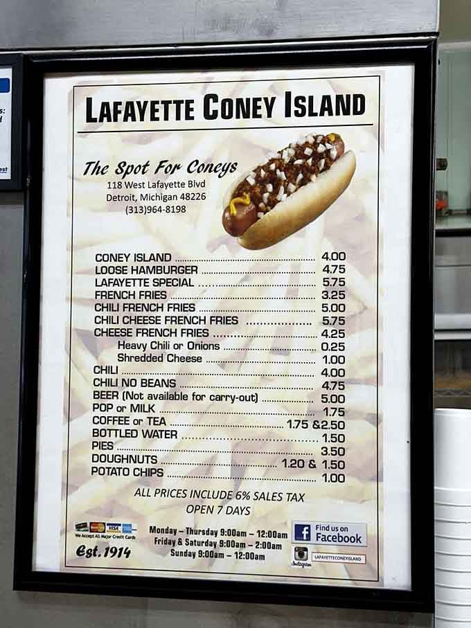 The menu board tells a beautiful story of simplicity: coney dogs, loose burgers, fries, and pure Detroit soul food.