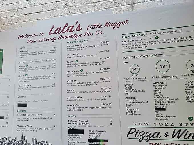 Lala's Little Nugget menu proving that New York pizza and Texas Christmas bars make perfect sense together.