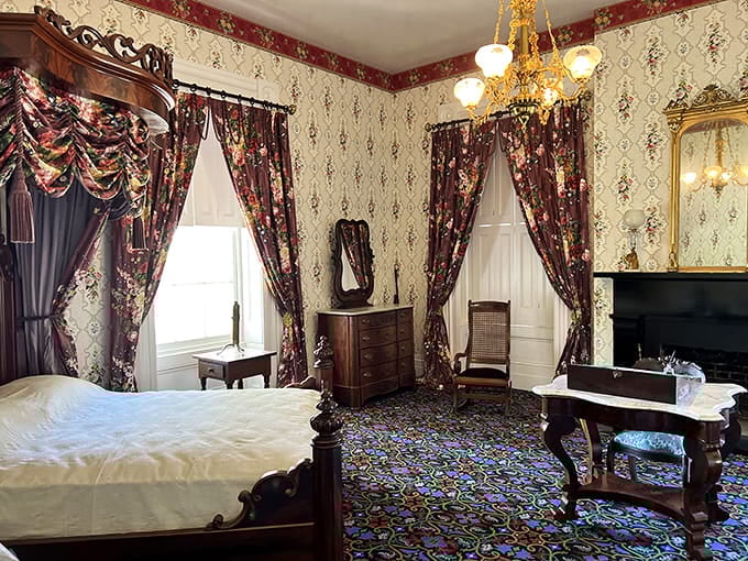 When your bedroom includes elaborate draperies and carved furniture, you know someone was living their best Victorian life.