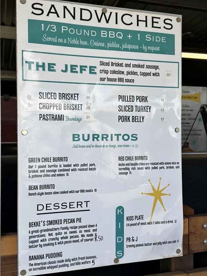 The menu board reveals creative fusion options like barbecue burritos alongside traditional Texas-style smoked meats.