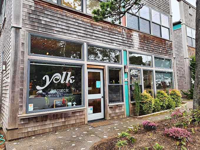 Yolk's cheerful storefront promises breakfast done right, where eggs and ocean views make mornings worth waking up for.