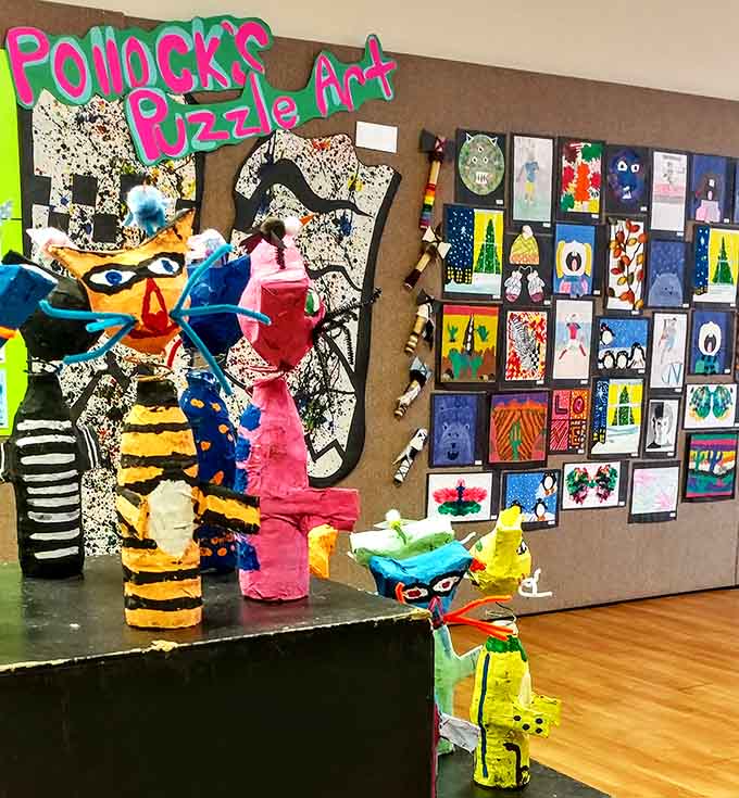 The McDowell Arts Council celebrates creativity with vibrant displays like this "Pollock's Puzzle Art" exhibit. Who says retirement means putting creativity on the shelf?