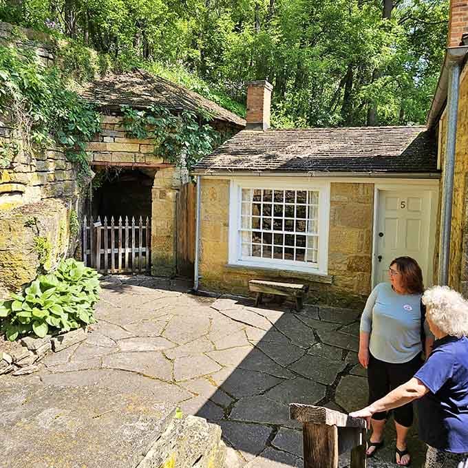 That white cottage tucked against the hillside is literally built into the rock, because Cornish miners were efficiency experts.