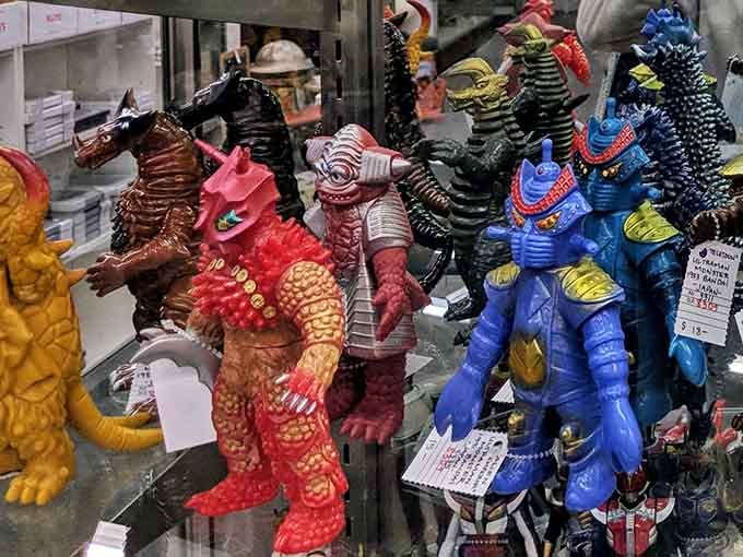 Godzilla and friends standing guard like the world's most colorful neighborhood watch program, ready to defend your display shelf.