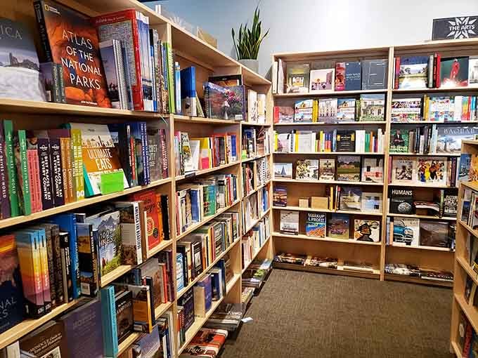Floor-to-ceiling shelves packed with possibilities, each spine a potential new favorite waiting to be discovered.