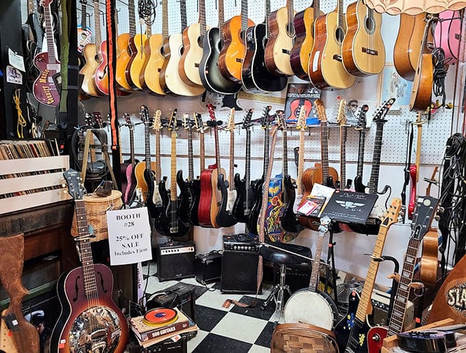 A wall of guitars waiting to tell their stories, from garage band dreams to coffee shop serenades.
