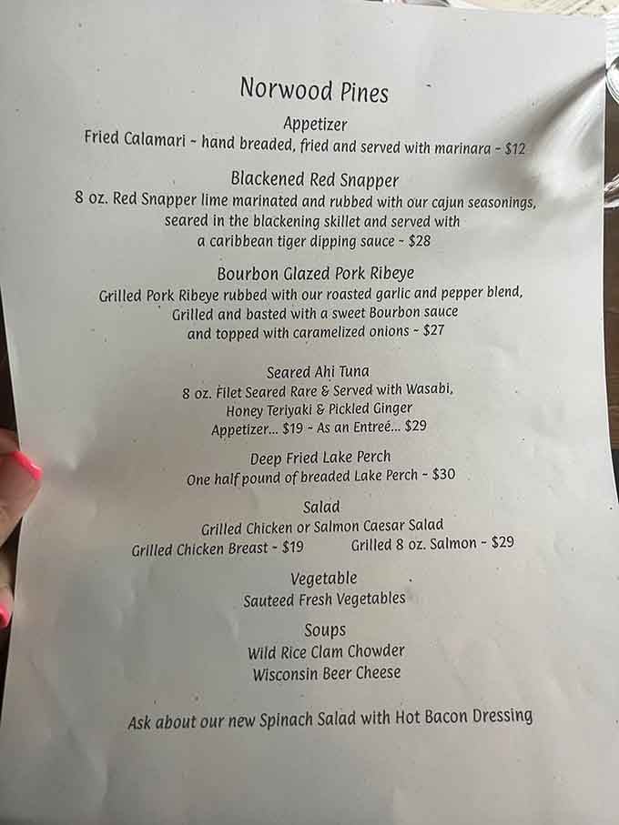 This menu reads like a love letter to Wisconsin dining, featuring everything from bourbon-glazed pork to wild rice clam chowder.