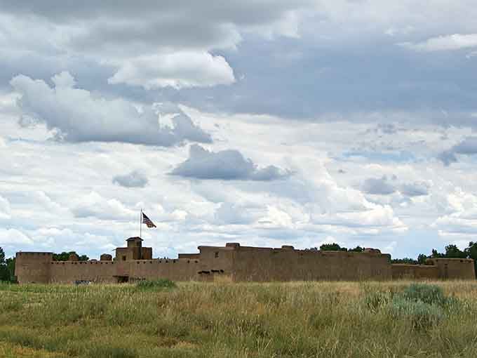 Standing alone on the plains under dramatic skies, this fort looks exactly like it did when it was the frontier's busiest hub.