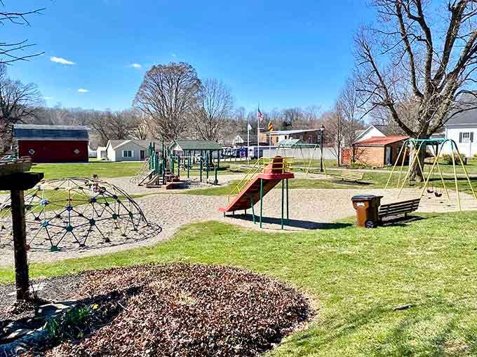 Even the playground equipment gets a scenic backdrop in this village where every view feels like a postcard.