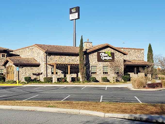 Olive Garden Stone Oak's rustic stone exterior offers a warm welcome to pasta-seeking patrons, proving chain restaurants can still deliver on atmosphere.