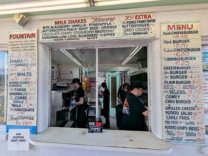 Behind that window, skilled hands are crafting milkshakes that could make a grown person weep with joy and nostalgia.