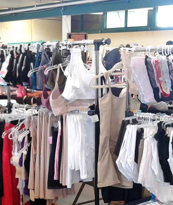 Racks of clothing stretching into the distance like a textile lover's fever dream come true.