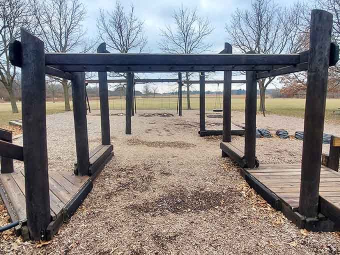 Those wooden beams aren't just playground equipment, they're the training ground for future American Ninja Warriors and fearless explorers.