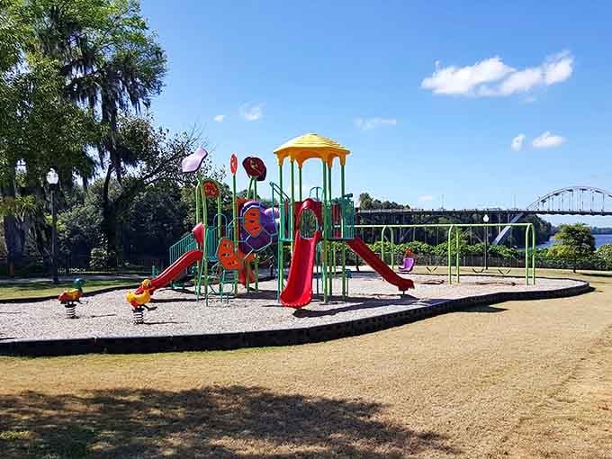 Who needs expensive playground equipment when you've got colorful slides, a gazebo, and the mighty Alabama River as your backdrop? Childhood magic with a side of history.