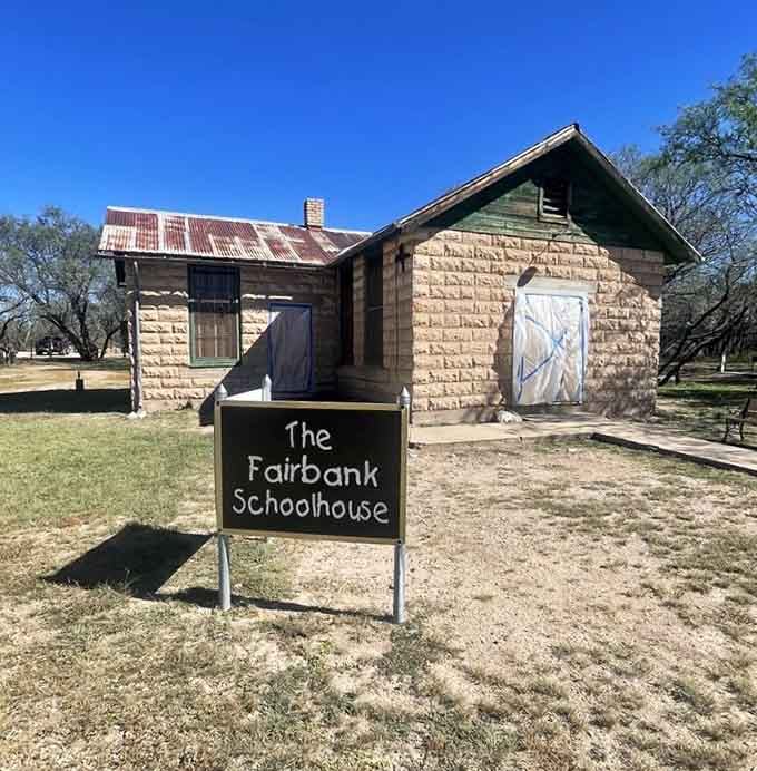 The Fairbank Schoolhouse stands proud, its adobe walls holding decades of lessons and childhood dreams within.