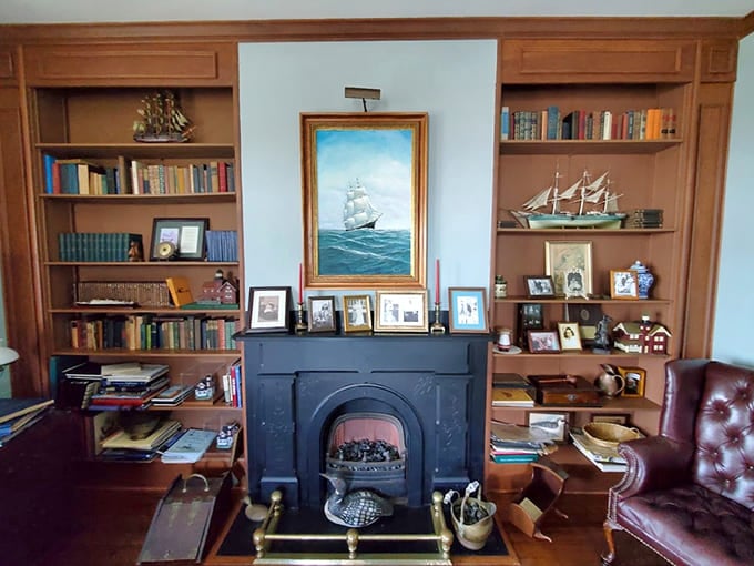 Maritime elegance meets cozy study vibes, complete with ship paintings and a fireplace for those foggy nights.