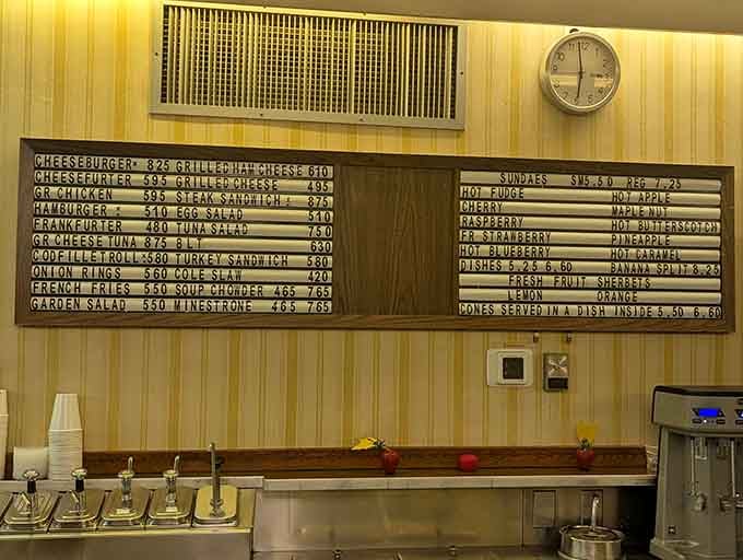 That old-school menu board with changeable letters is more honest than any Instagram filter could ever be.