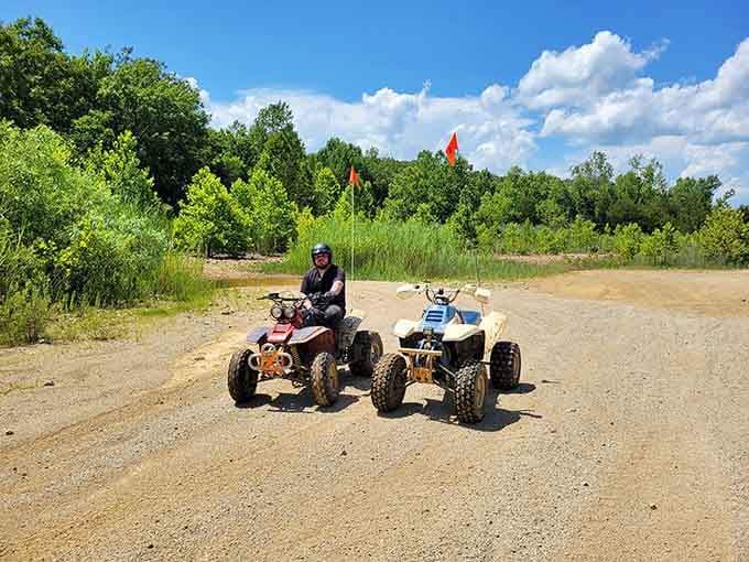 Two ATVs ready to tackle the trails, because sometimes the best therapy involves mud and horsepower.