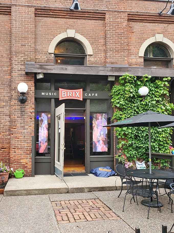 That living wall of ivy transforms brick and mortar into something magical, like nature decided to collaborate with architecture.