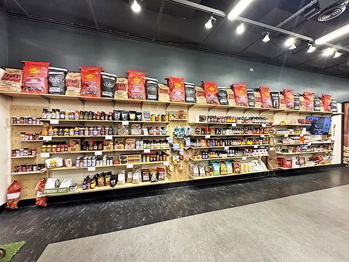 The Wall of Flavor houses enough rubs, sauces, and seasonings to make your spice cabinet at home look like a sad, neglected orphan.
