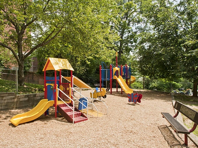 Spring Park's playground equipment has seen generations of kids discover gravity the fun way.