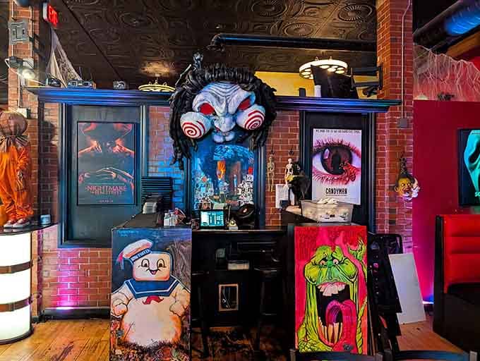 Horror movie props that would make any collector weep with envy line the walls like trophies.