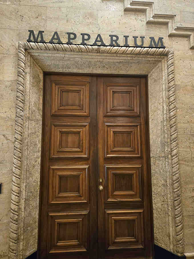 Behind these handsome wooden doors lies one of Boston's best-kept secrets: a three-story sphere that defies all expectations.