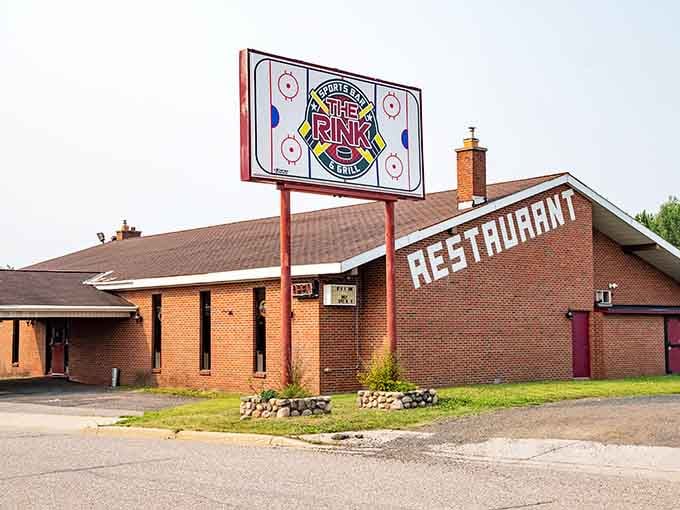 The Rink Bar & Grill embraces hockey heritage with the subtlety of a slap shot, promising comfort food that sticks to your ribs like a good checking line.