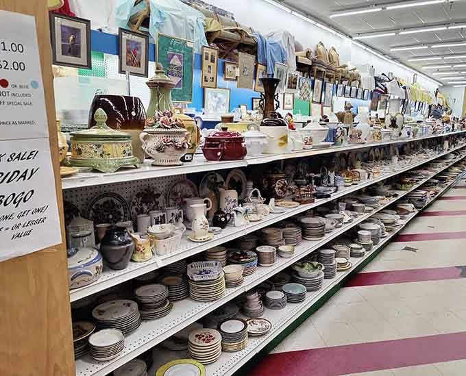 Porcelain paradise! Dishes stacked with the precision of a Jenga tournament, each one waiting to tell its dinnertime stories.