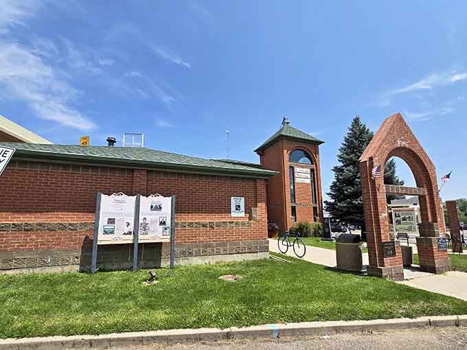 The Welcome Center's brick archway stands ready to greet travelers like a friendly neighbor who actually means it.