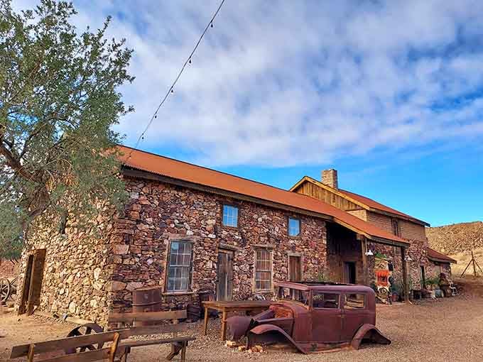 That stone building with the bright blue roof has been standing since your grandparents' grandparents were young.