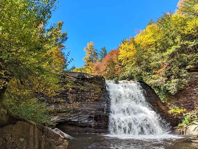 Autumn transforms these falls into something that belongs on a postcard, not three hours from home.