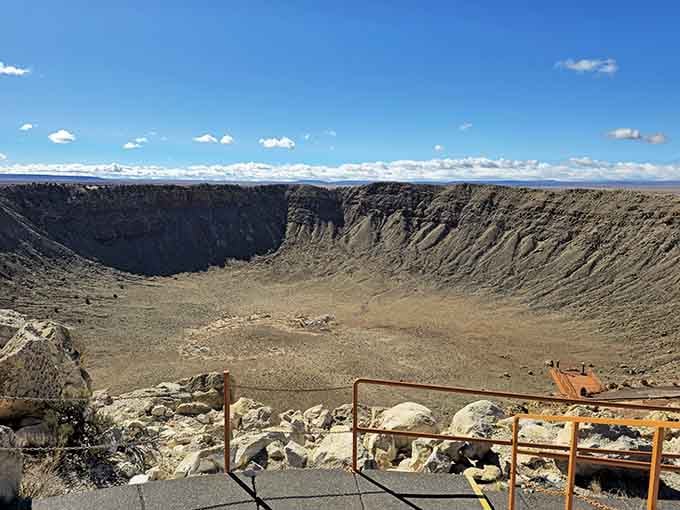 When a space rock traveling 26,000 miles per hour meets Earth, you get this jaw-dropping crater that humbles every visitor instantly.