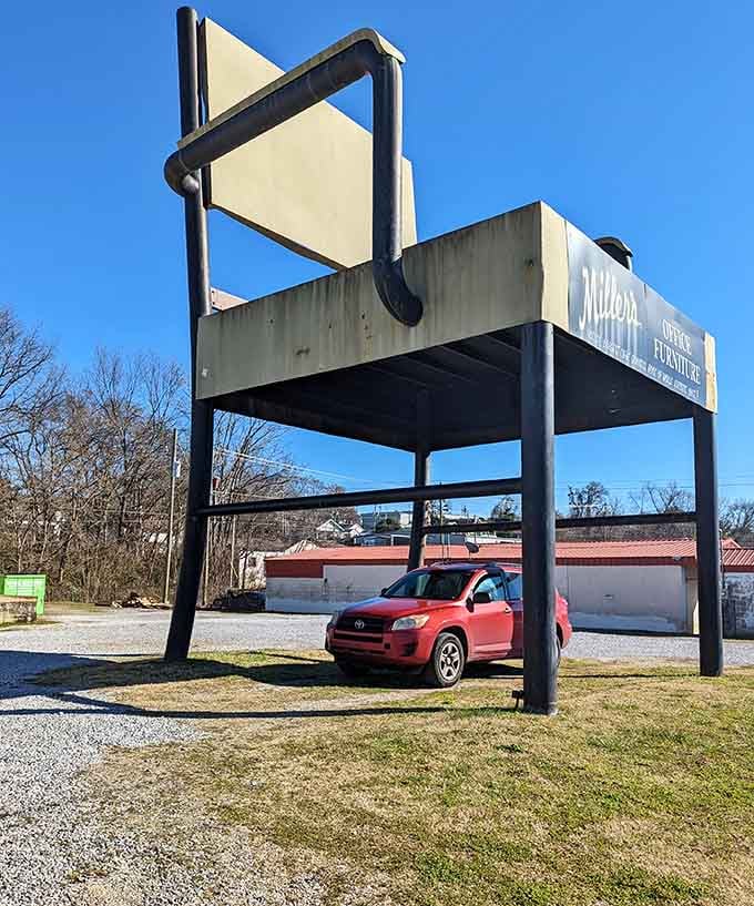 Your car fits perfectly under this chair, proving that some parking spots are more memorable than others.